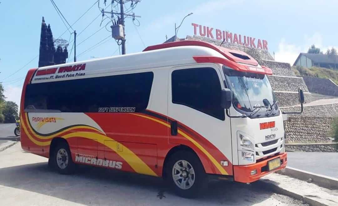 Mobil Elf Long, Spesifikasi dan Kapasitas Kursi Isi Berapa? - Wandi Trans